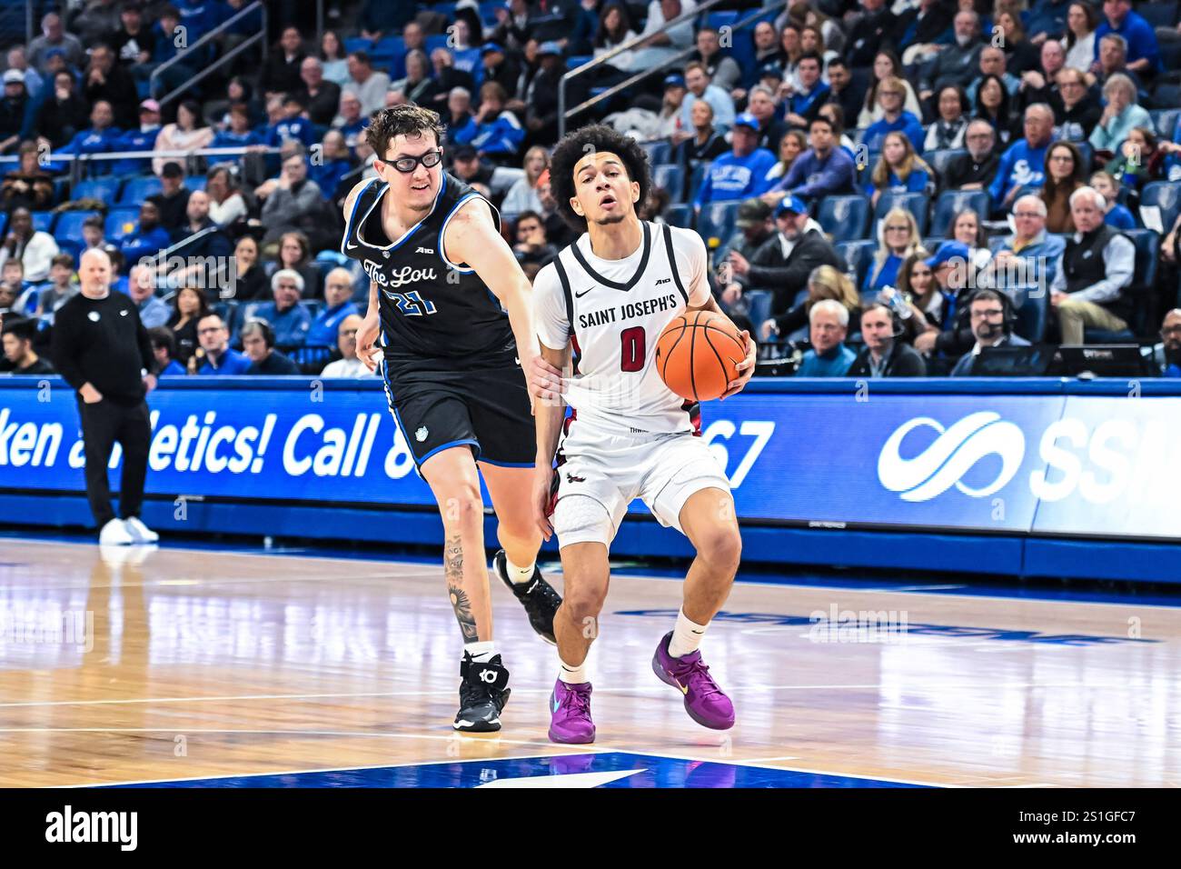 JANUARY 03, 2025: Saint Louis Billikens center Robbie Avila (21) grabs ...