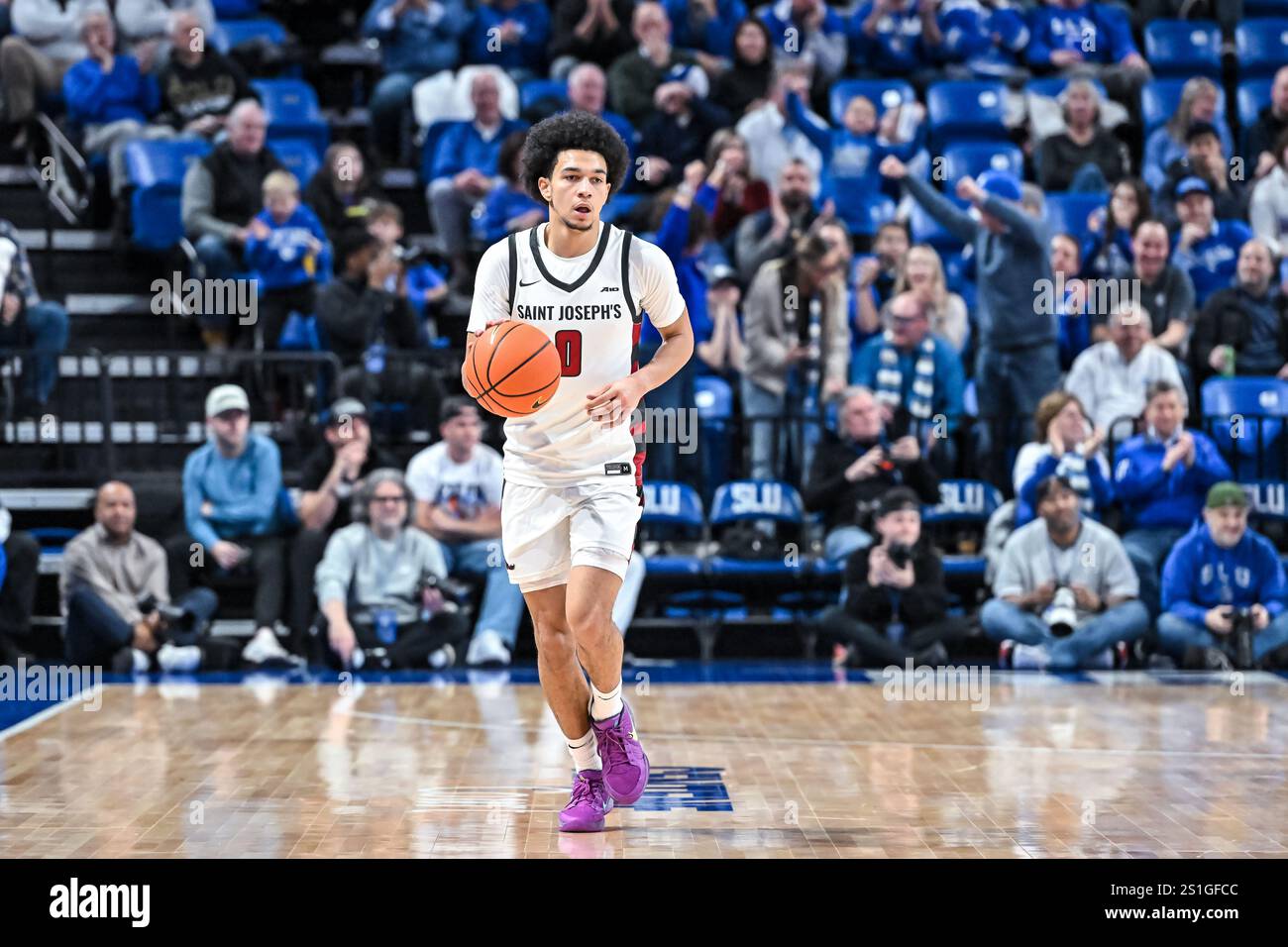 JANUARY 03, 2025: Saint Joseph's Hawks guard Derek Simpson (0) brings ...