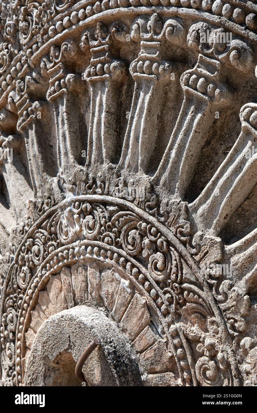 An ancient dharmachakra or wheel of dharma at Si Thep Historical Park ...