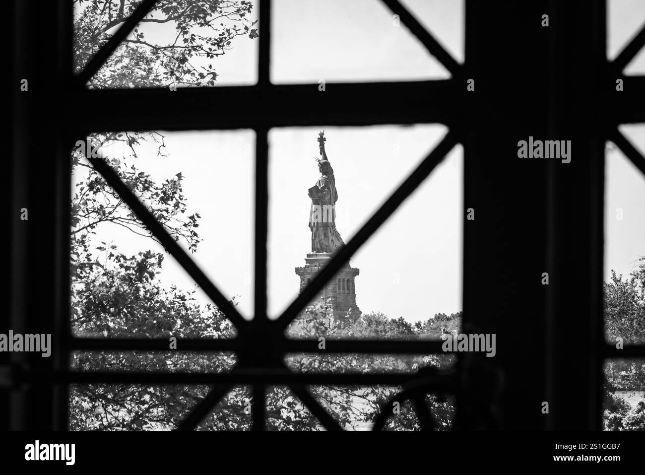 Black and white photo of the Statue of Liberty taken at a distance ...