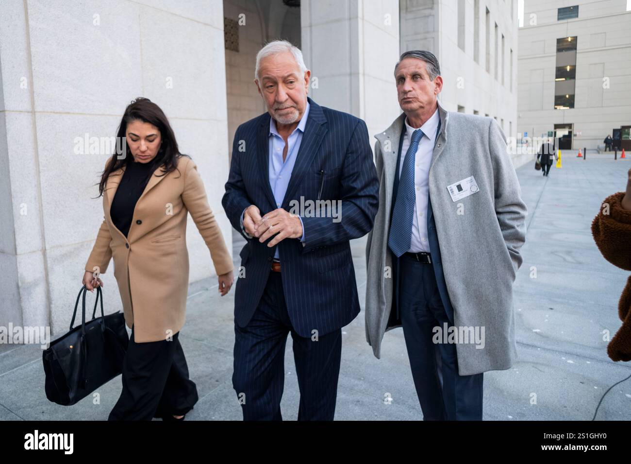 Attorneys Mark Geragos (C), and Bryan Freedman (R) leave the Hall of ...