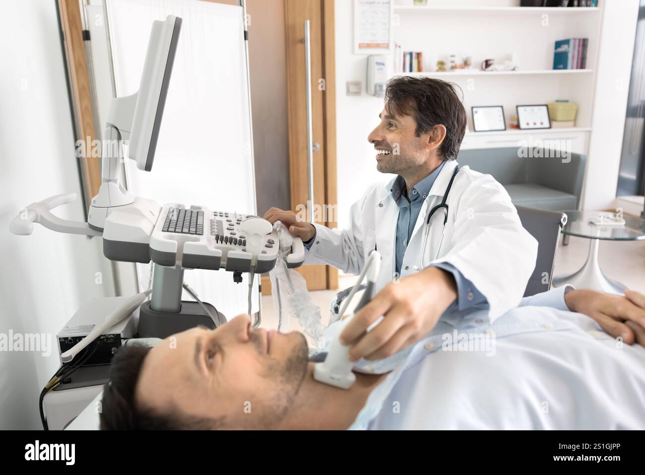 Positive ultrasound diagnosis doctor using scanner for examining male ...