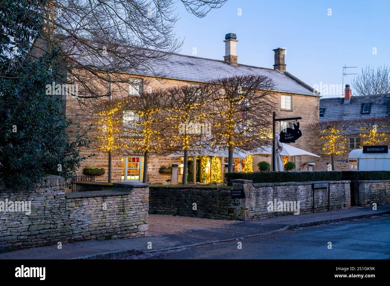 The Wild Rabbit pub with christmas decorations on a early frosty ...