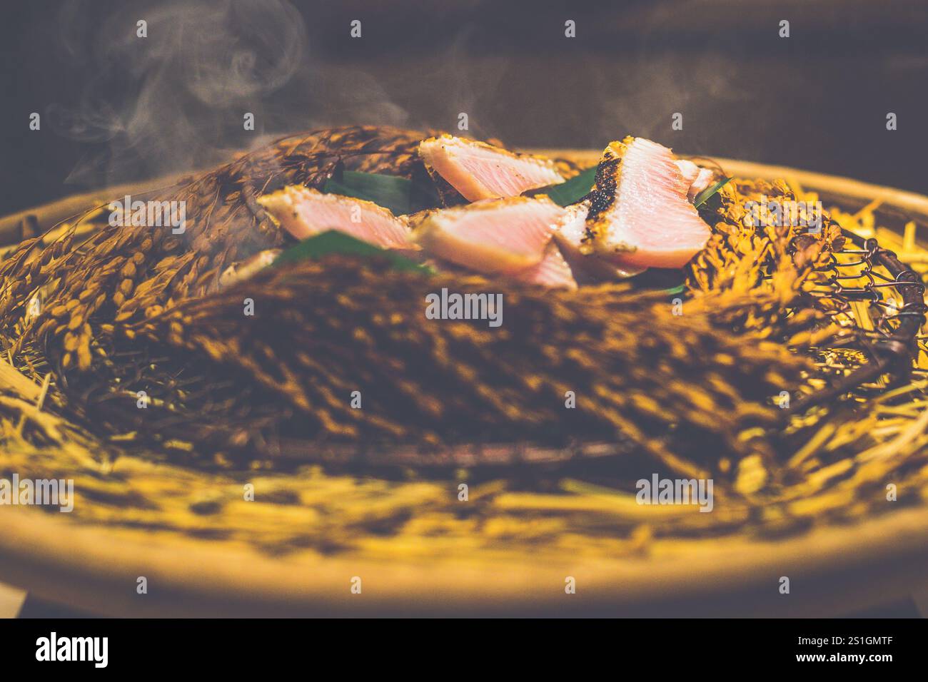 japanese winter Amberjack yellowtail fish smoked in Japanese rice straw ...