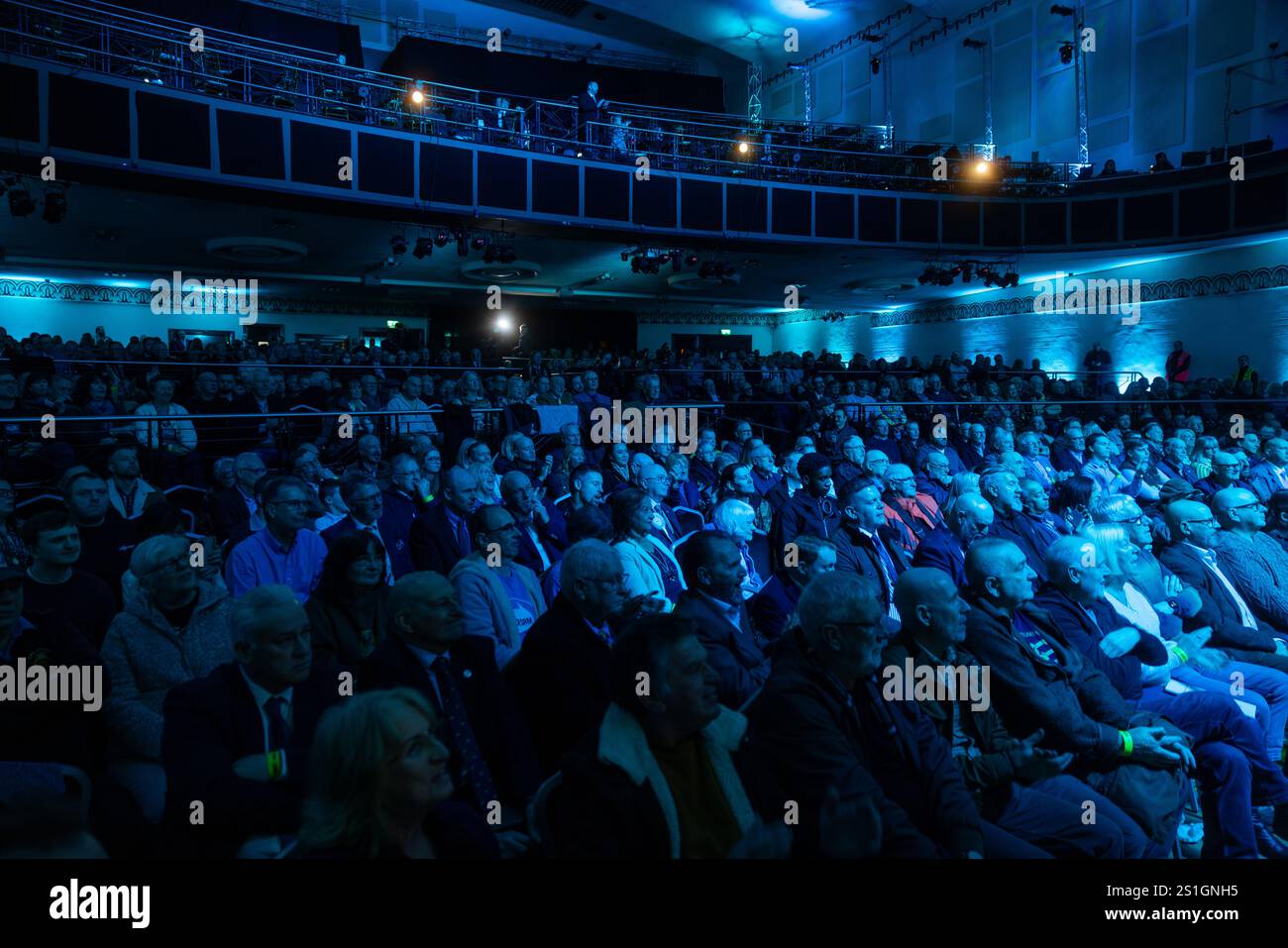 Leicester, UK. 03 01, 2025. Attendees watch on at the Reform UK East ...