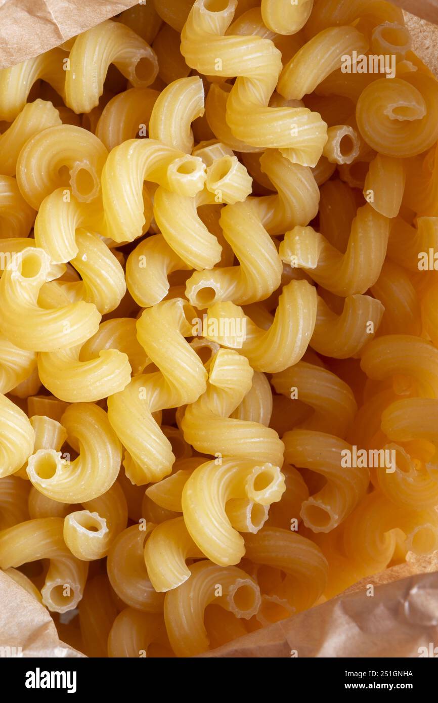 Spirali dried pasta in a brown paper bag. Eco-friendly recycling ...