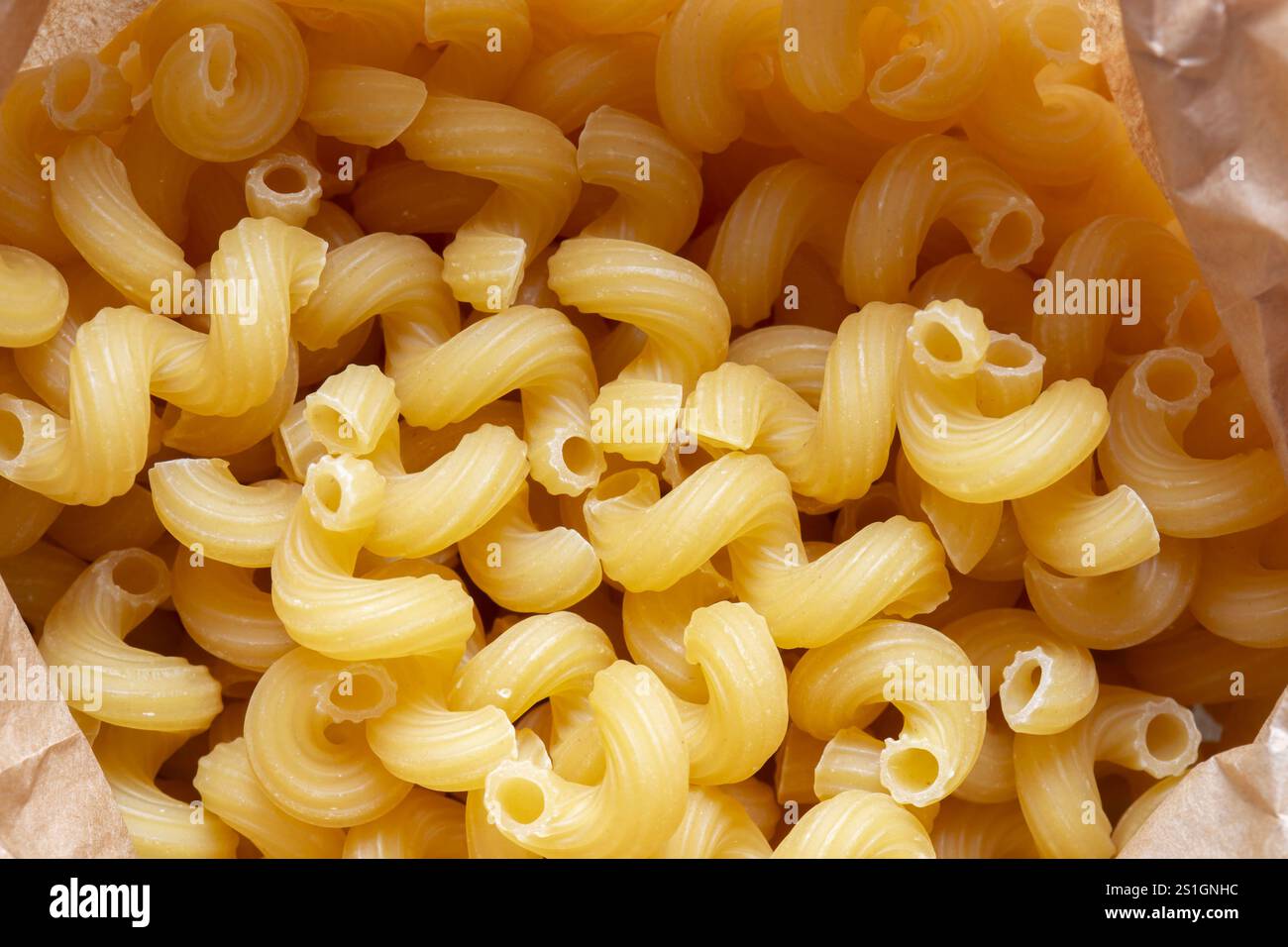 Spirali dried pasta in a brown paper bag. Eco-friendly recycling ...