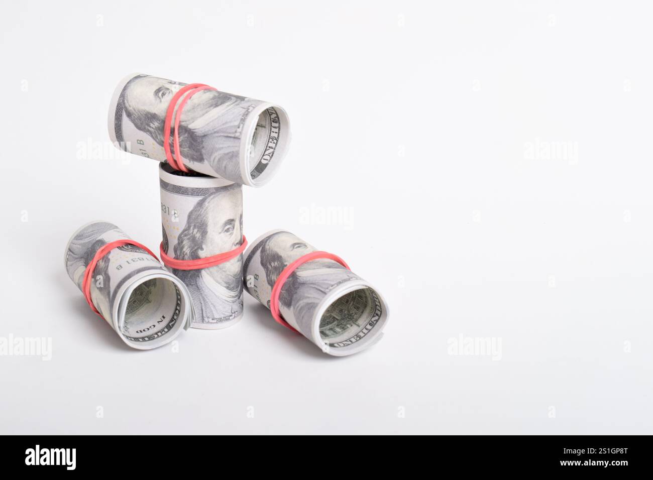 Bundle of money roll of dollars isolated on white background. One ...