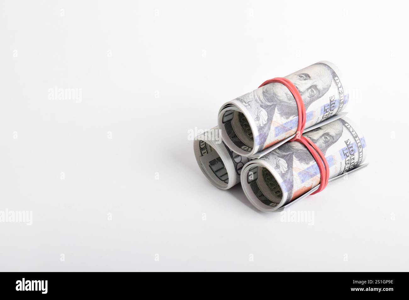 Bundle of money roll of dollars isolated on white background. One ...