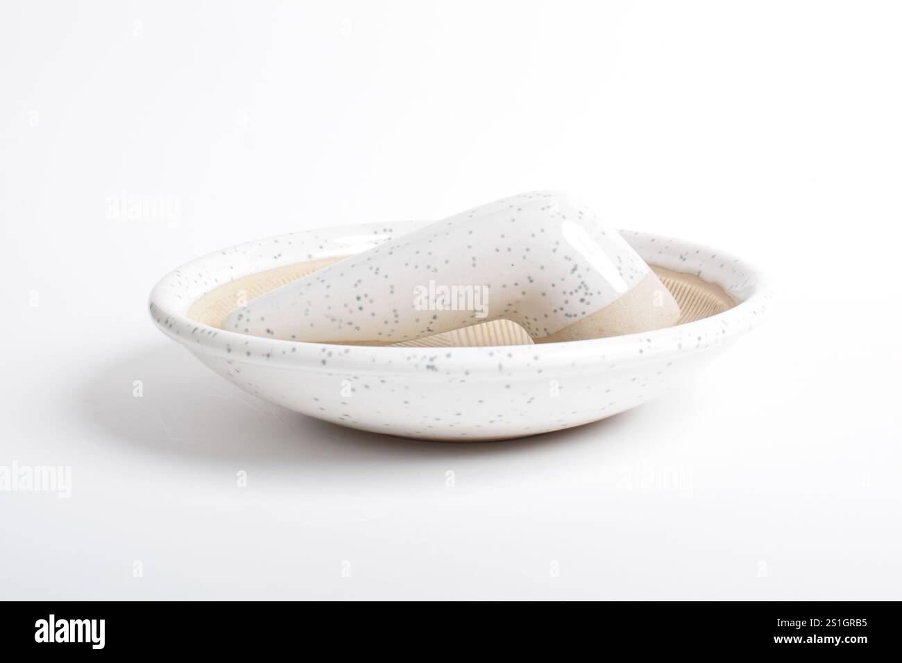 Ceramic mortar and pestle isolated on white background. Cliping path ...