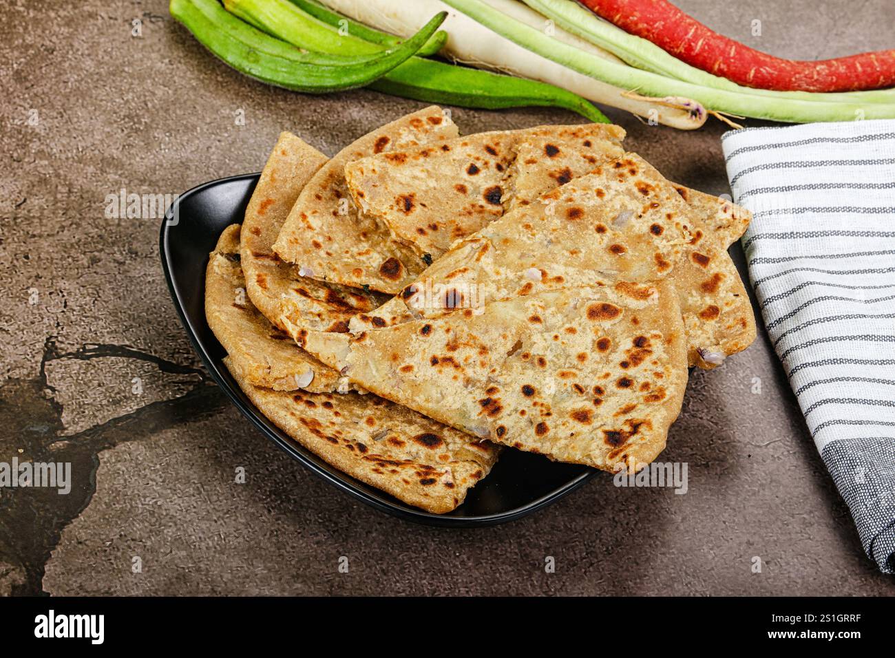 Indian vegetarian Aloo Paratha - bread with potato Stock Photo - Alamy