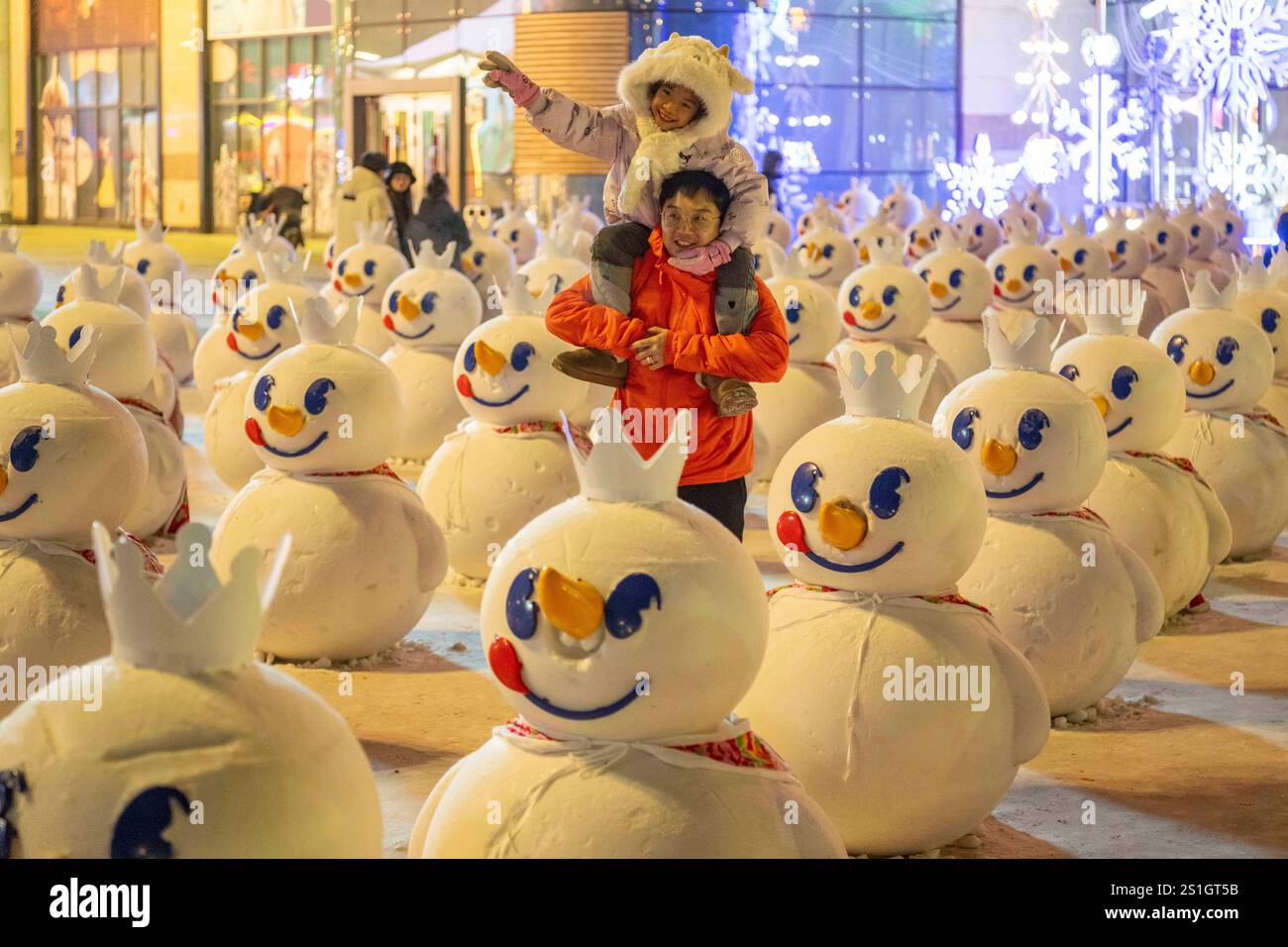 Harbin, China's Heilongjiang Province. 3rd Jan, 2025. People have fun ...