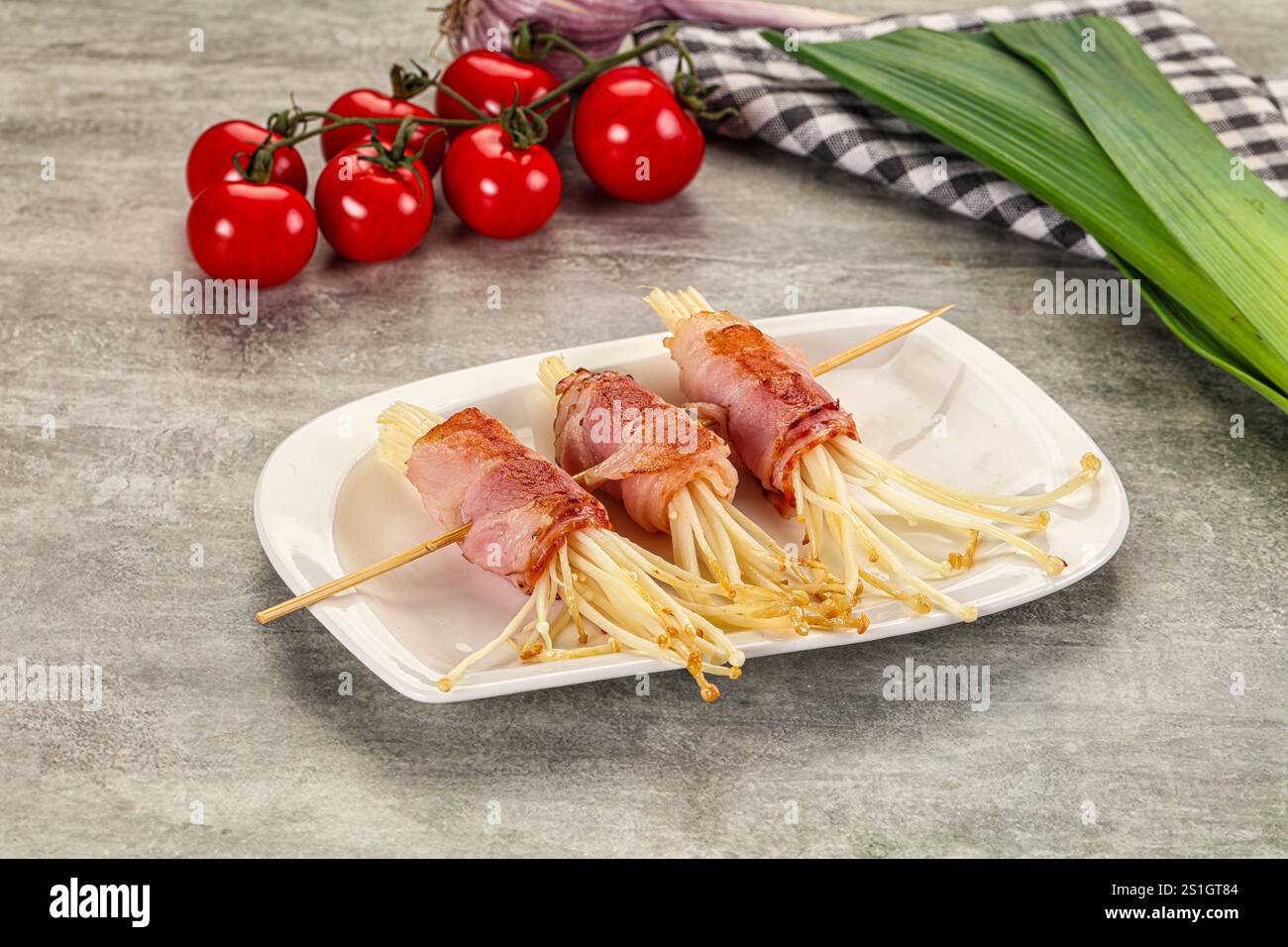 Grilled enoki mushroom with bacon roll wrap Stock Photo - Alamy