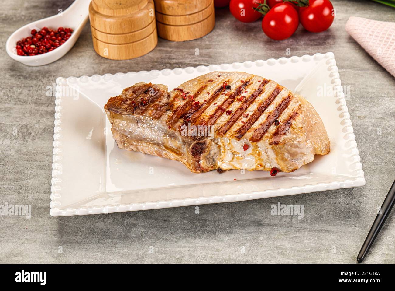 Grilled fat pork loin steak with bone Stock Photo - Alamy
