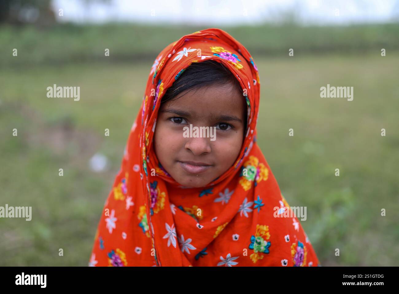 A portrait of a Bangladeshi rural girl in the Haor region of Mohonganj ...