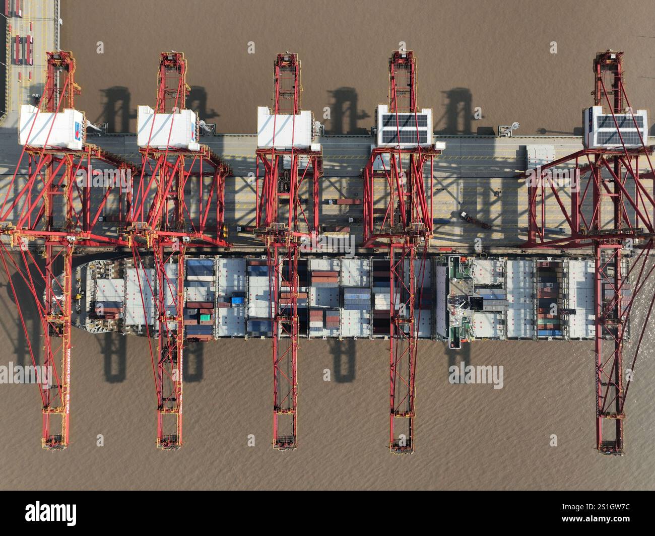 NINGBO, CHINA - JANAURY 4, 2025 - Cargo ships load and unload ...