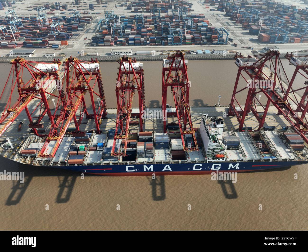 NINGBO, CHINA - JANAURY 4, 2025 - Cargo ships load and unload ...