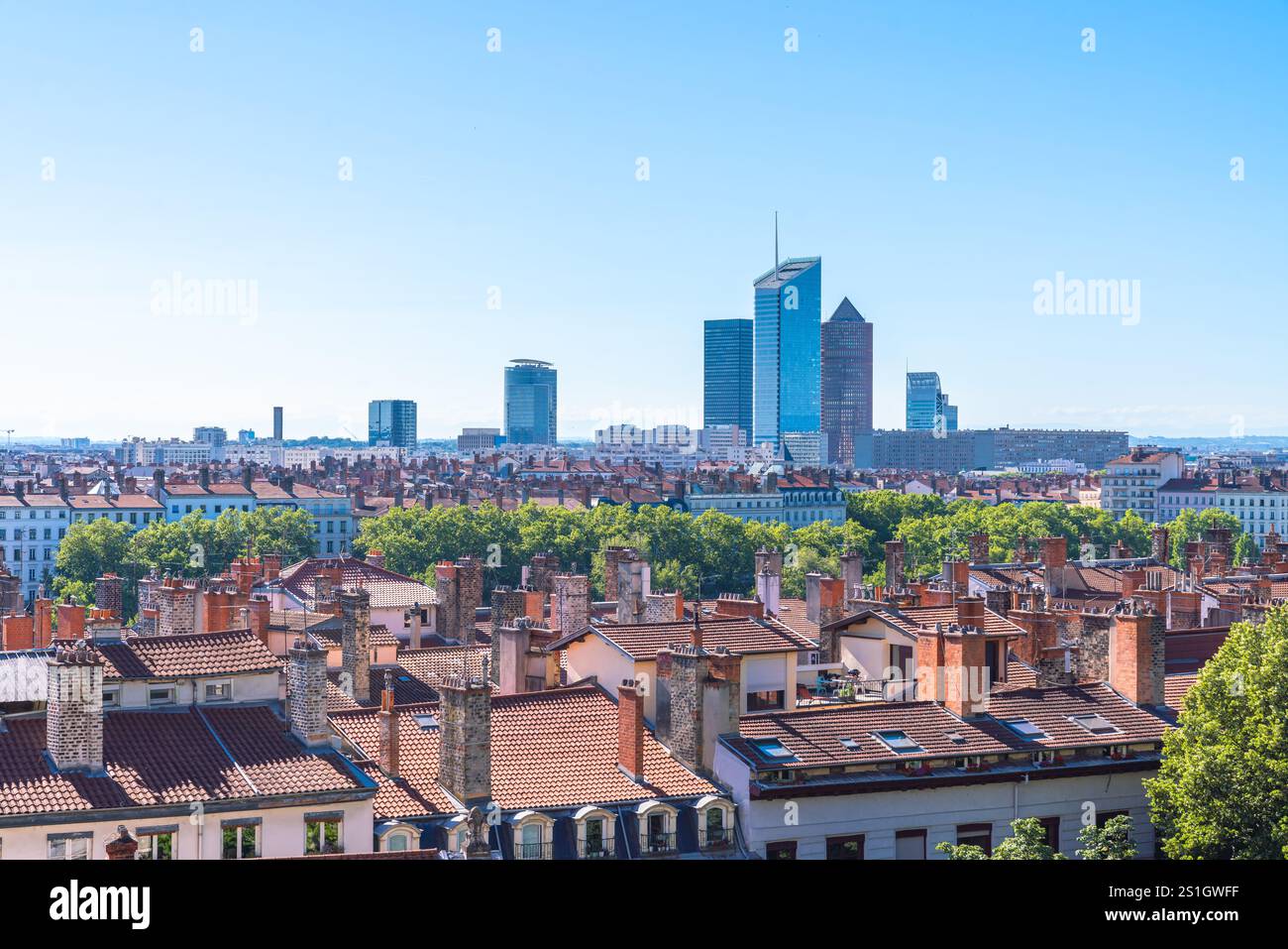 Modern skyscrapers rise in the downtown district over the residential ...