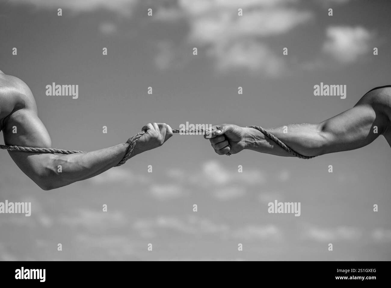 Two hands, helping hand, arm, friendship. Rope, cord. Hand holding a ...