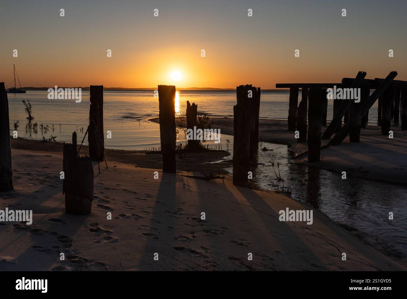 McKenzie jetty pier, sunset over ocean, K'gari, Fraser Island ...