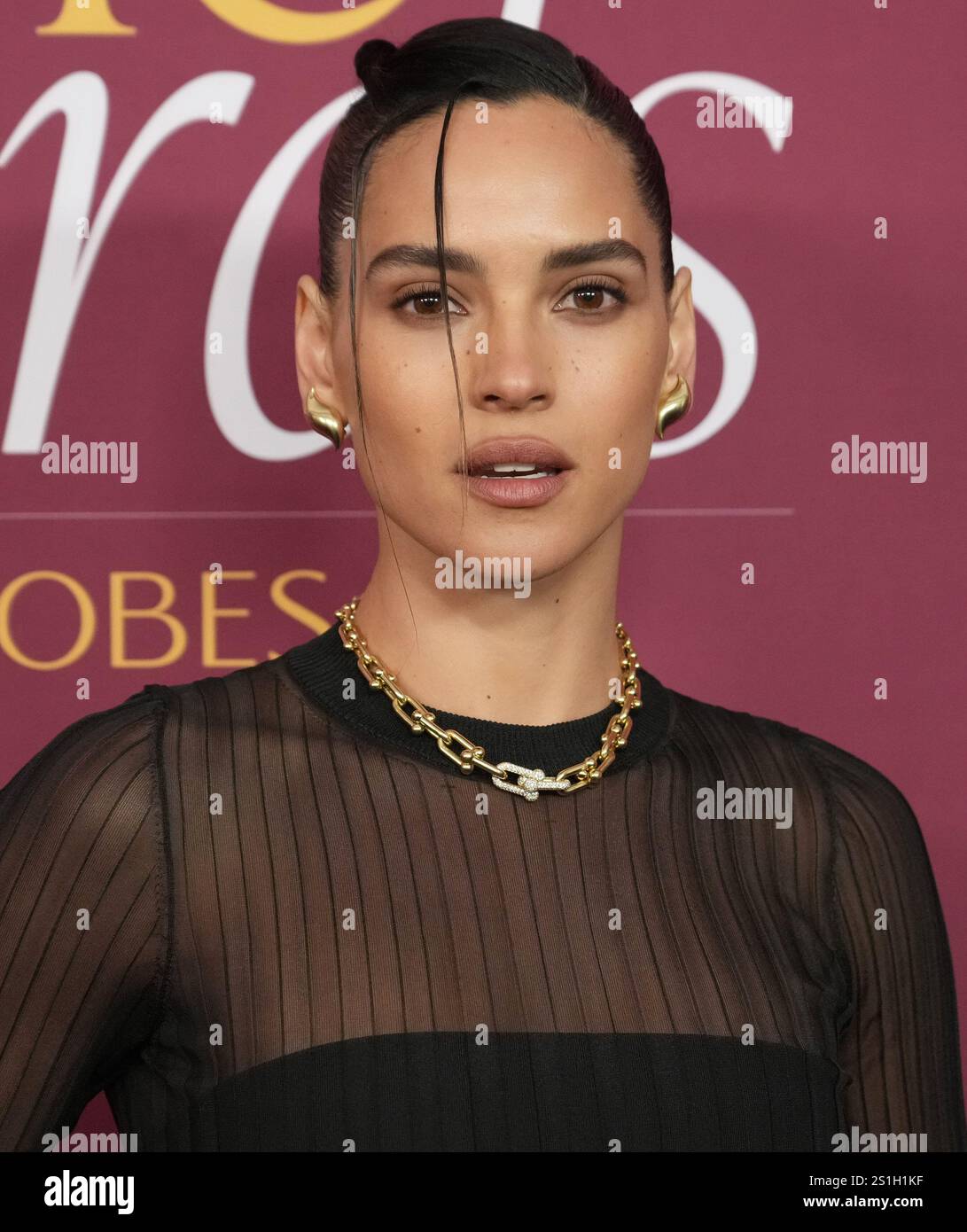 Adria Arjona arrives at the 2025 WWD Style Awards, Golden Globes held ...