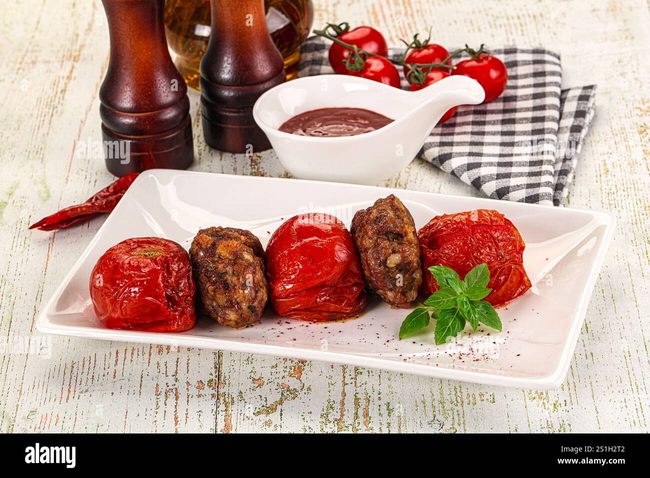 Turkish cuisine - Domatesli Kebab with minced meat and tomato Stock ...