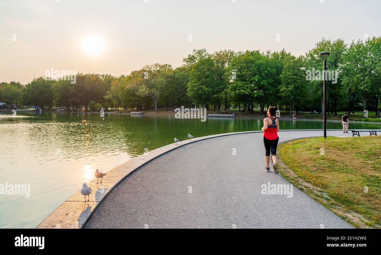 Mount Royal Park ( Parc du Mont-Royal ) Beaver Lake in summer sunset ...