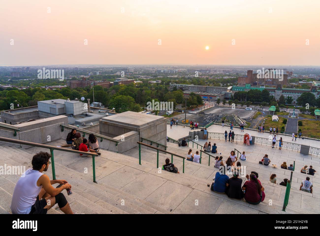 People are enjoying the sunset at Saint Joseph's Oratory of Mount Royal ...