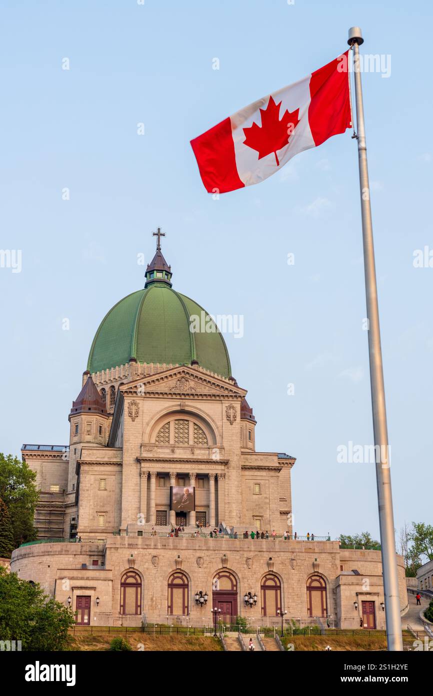 Saint Joseph's Oratory of Mount Royal and Canadian flag. Montreal ...