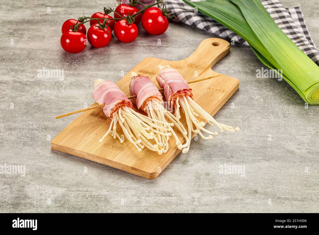 Raw roll with enoki mushroom and bacon Stock Photo - Alamy