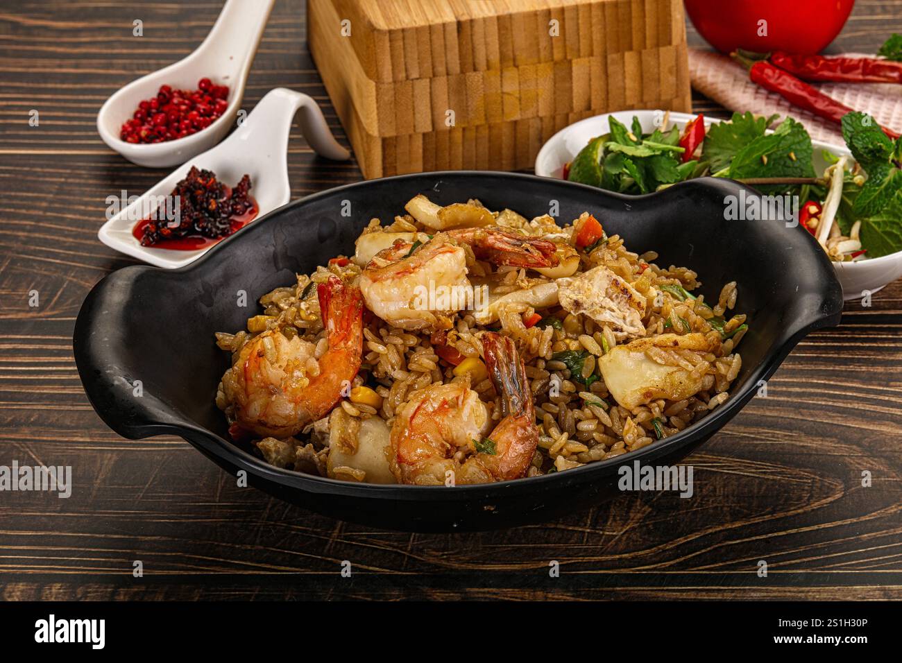 Vietnamese traditional fried rice with prawn and squid - Kom Ran Stock ...