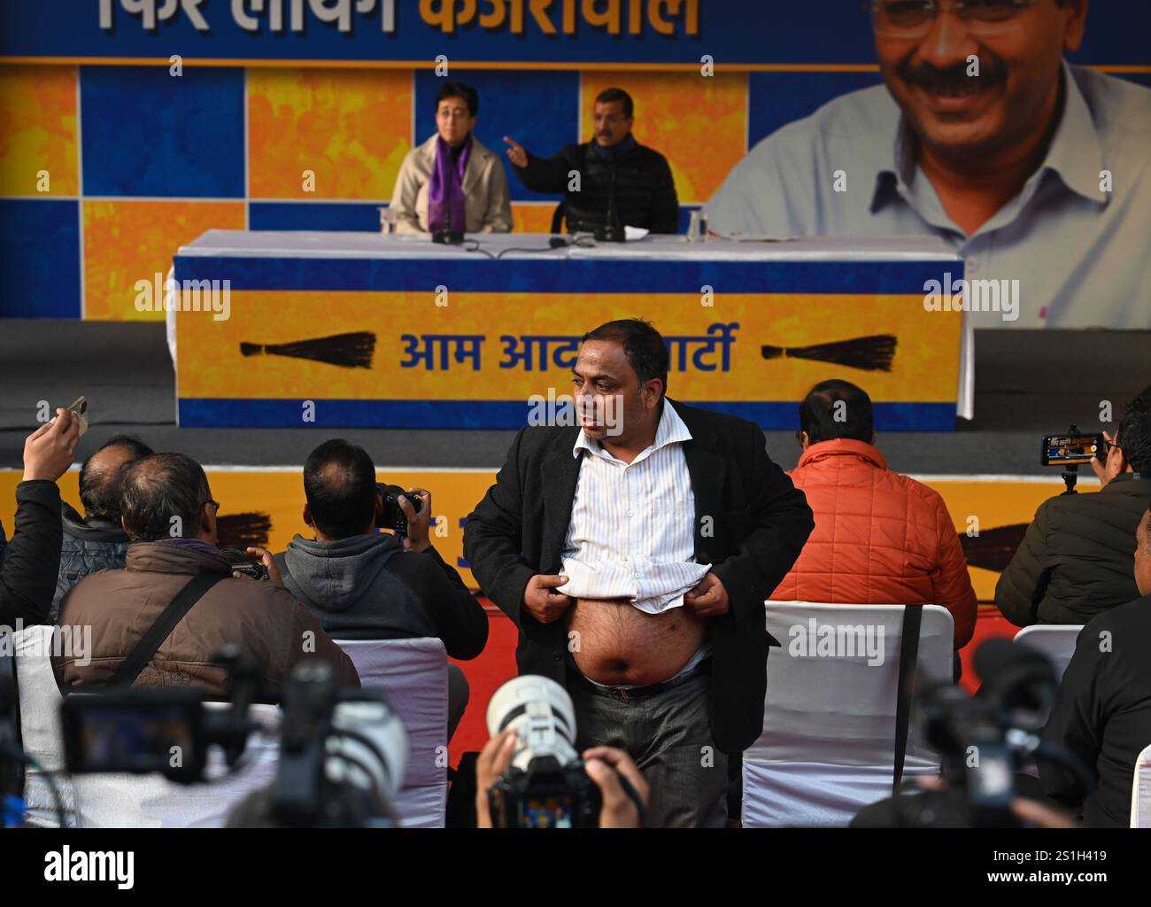 NEW DELHI, INDIA - JANUARY 3: A showing man showing his belly asking ...