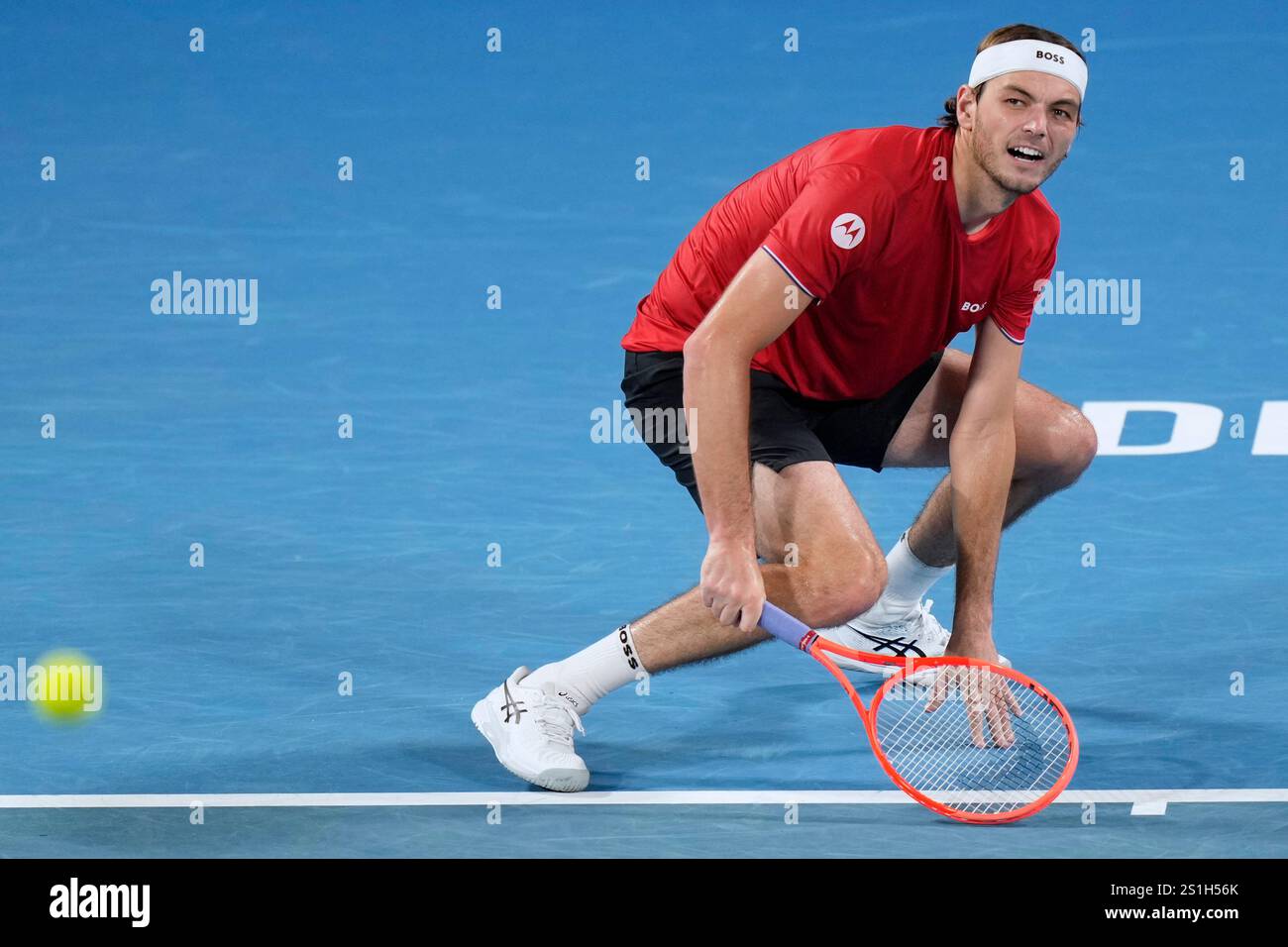 Taylor Fritz of the U.S. plays a shot to Czechia's Tomas Machac during ...