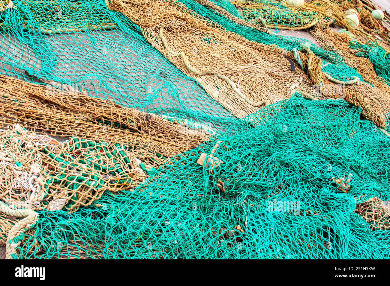 Heap drying of industrial fishing nets Stock Photo - Alamy