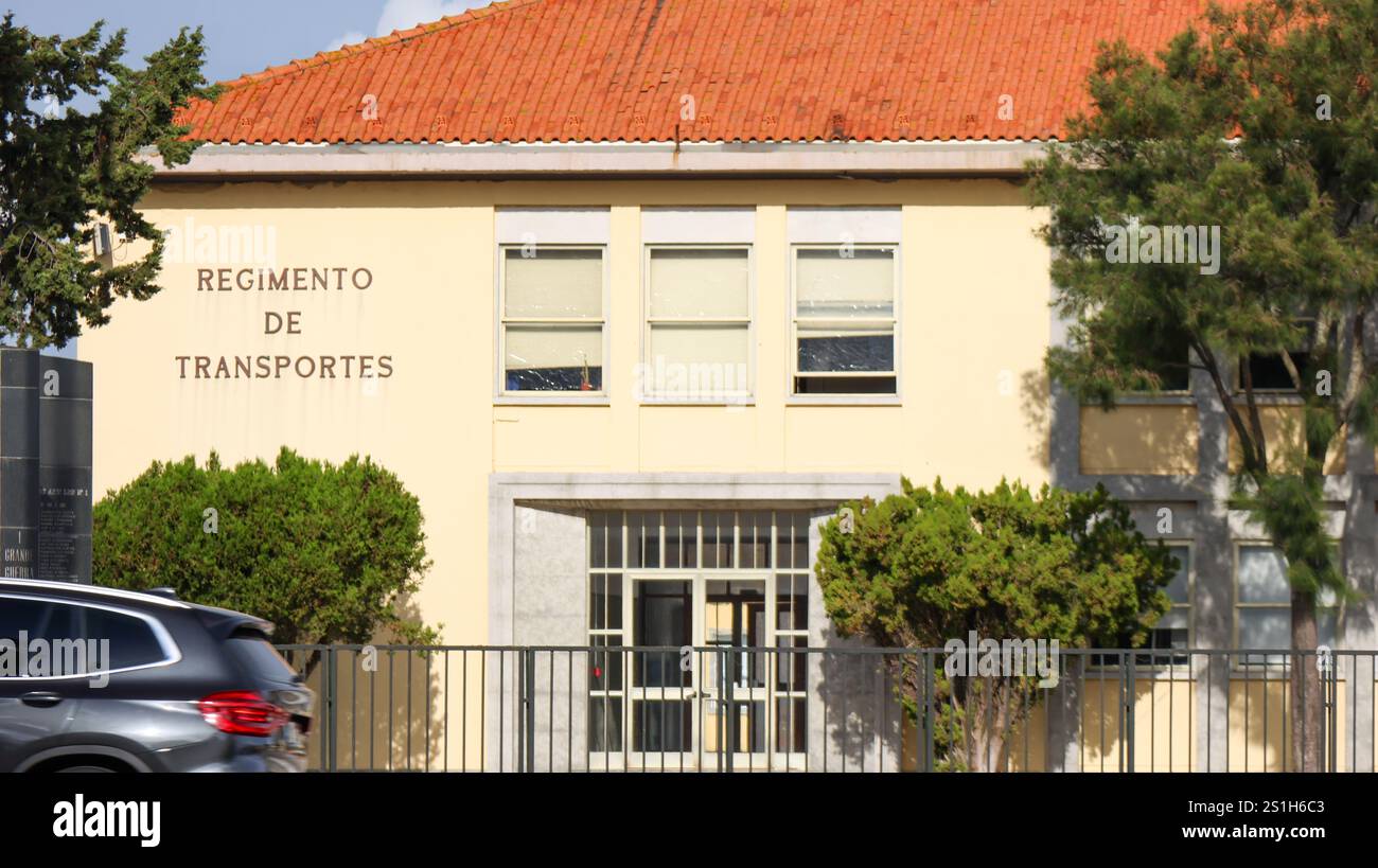 Facade of the army transport regiment military base building with metal ...