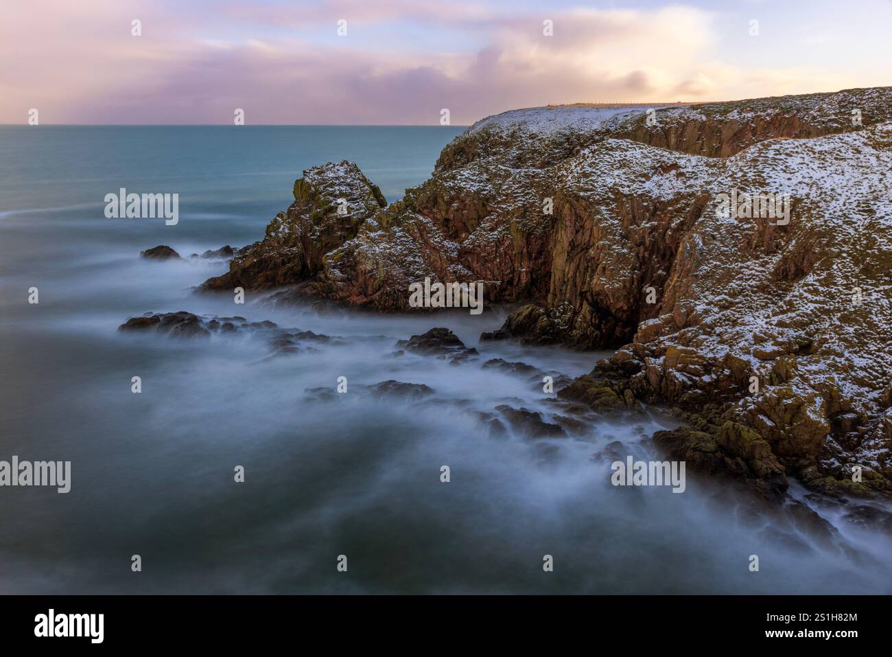 The rugged coast of Bullers of Buchan is located south of Peterhead in ...