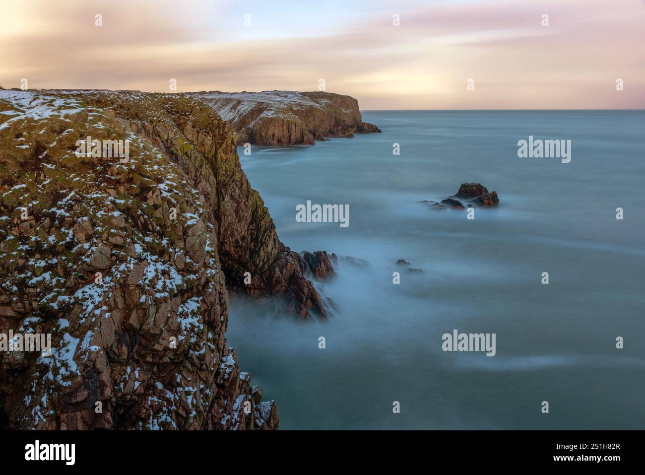 The rugged coast of Bullers of Buchan is located south of Peterhead in ...