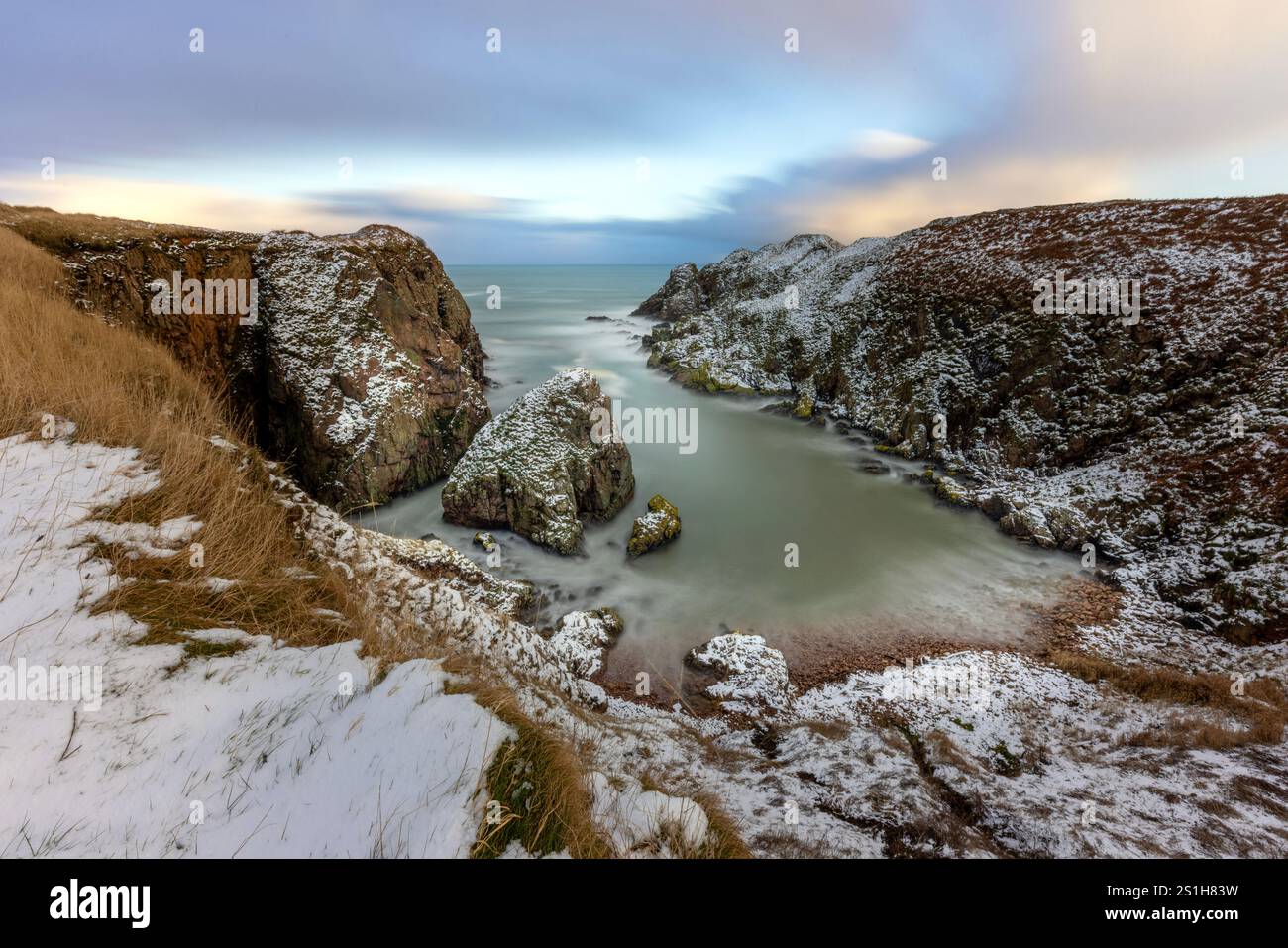 The rugged coast of Bullers of Buchan is located south of Peterhead in ...
