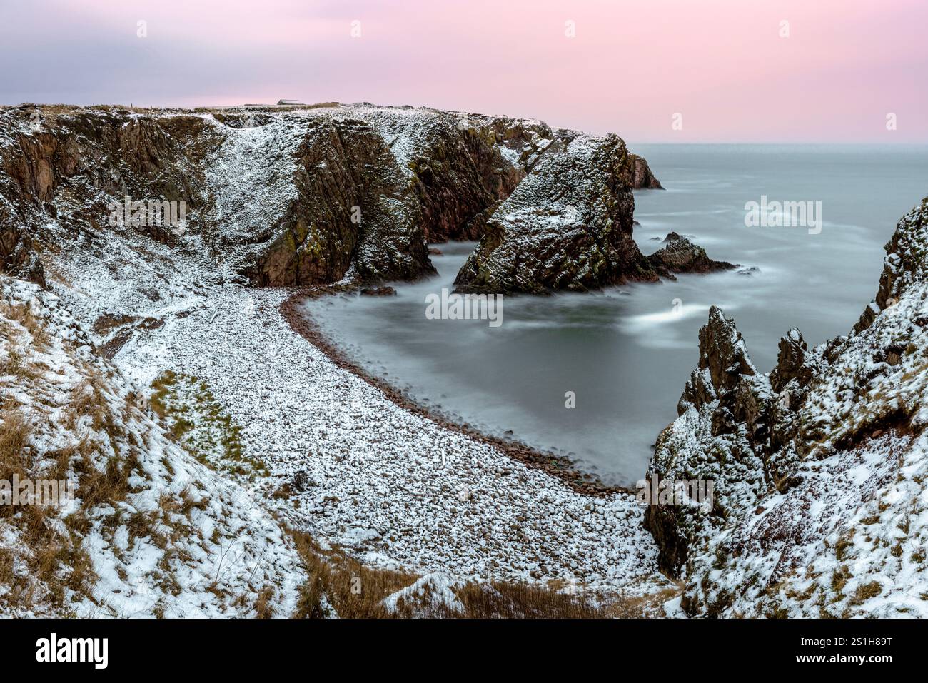 The rugged coast of Bullers of Buchan is located south of Peterhead in ...