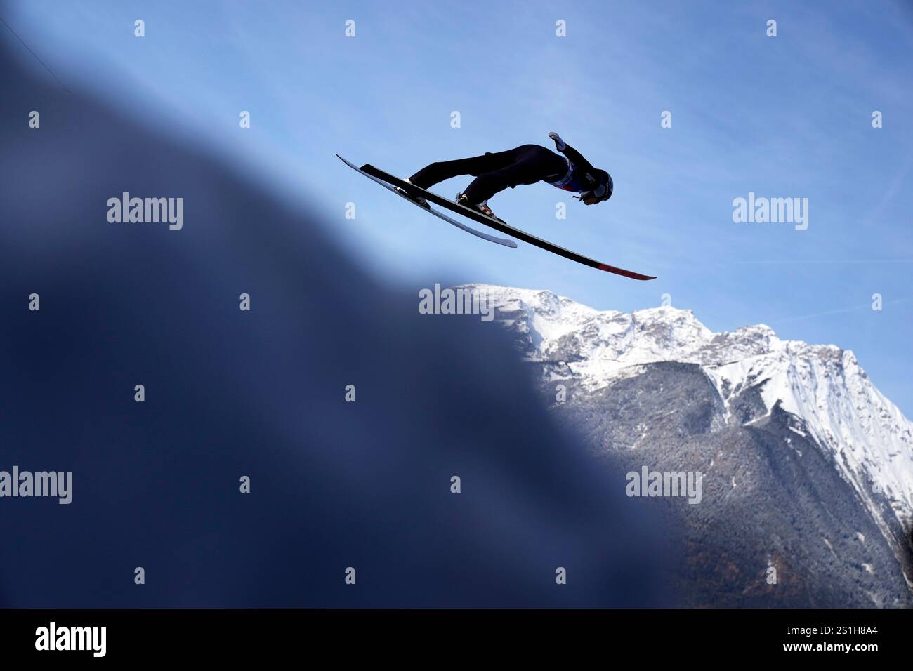 Andreas Wellinger, of Germany, soars through the air during his trial ...