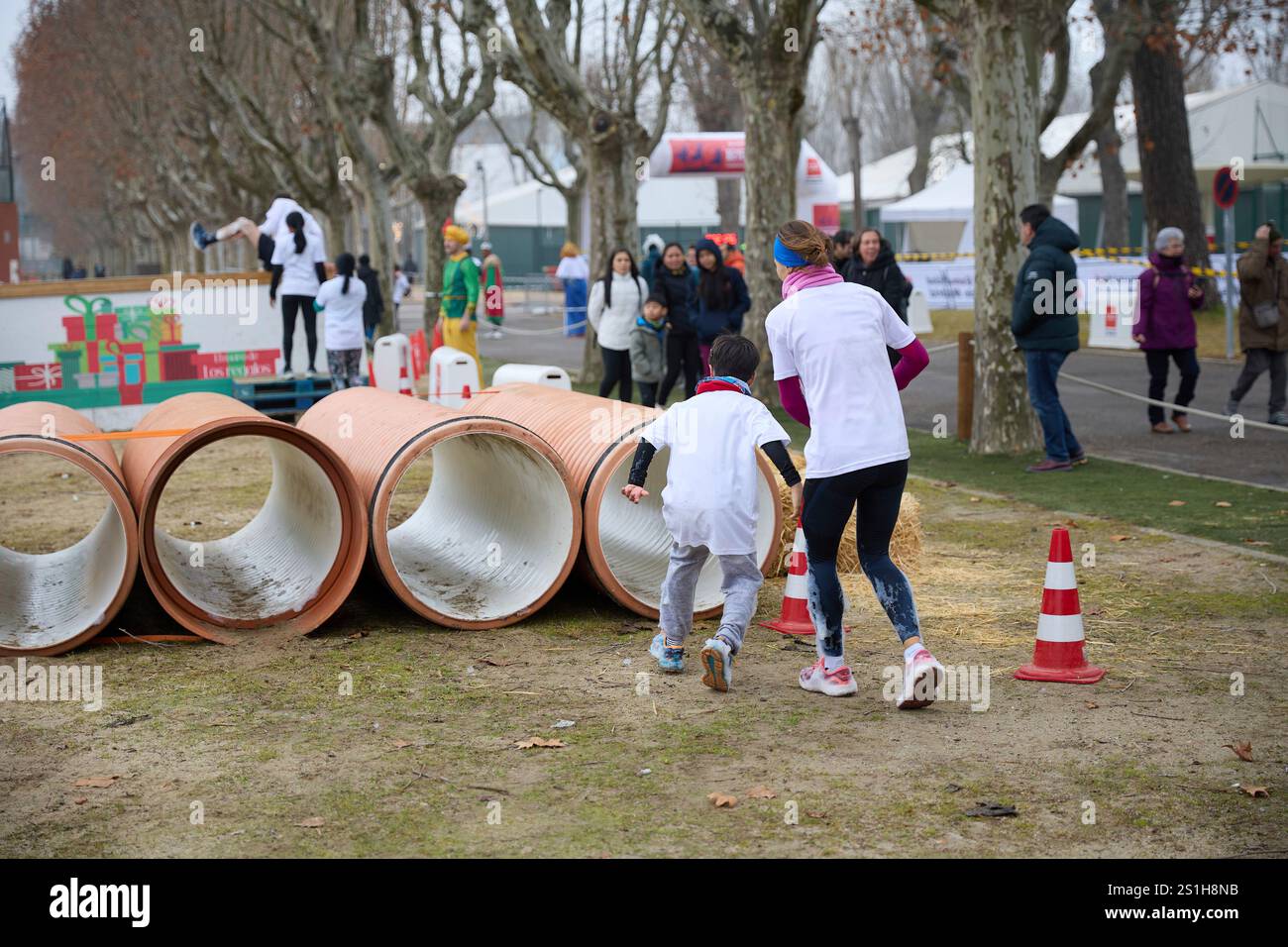 Several people take part in the 2nd Three Kings Popular Obstacle Race ...