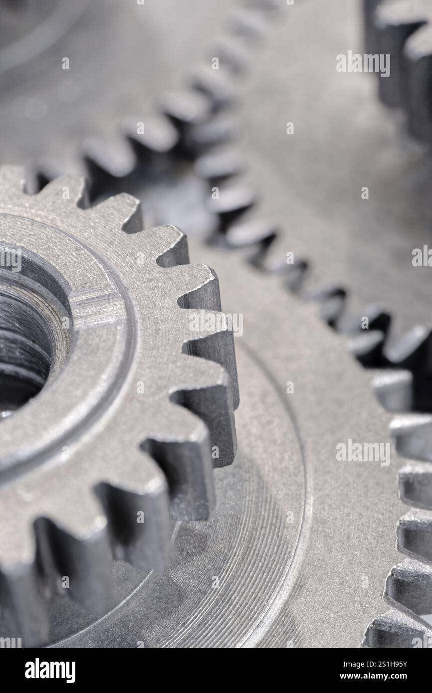 Steel gearwheels, part of gear transmission, close up shot, selective ...