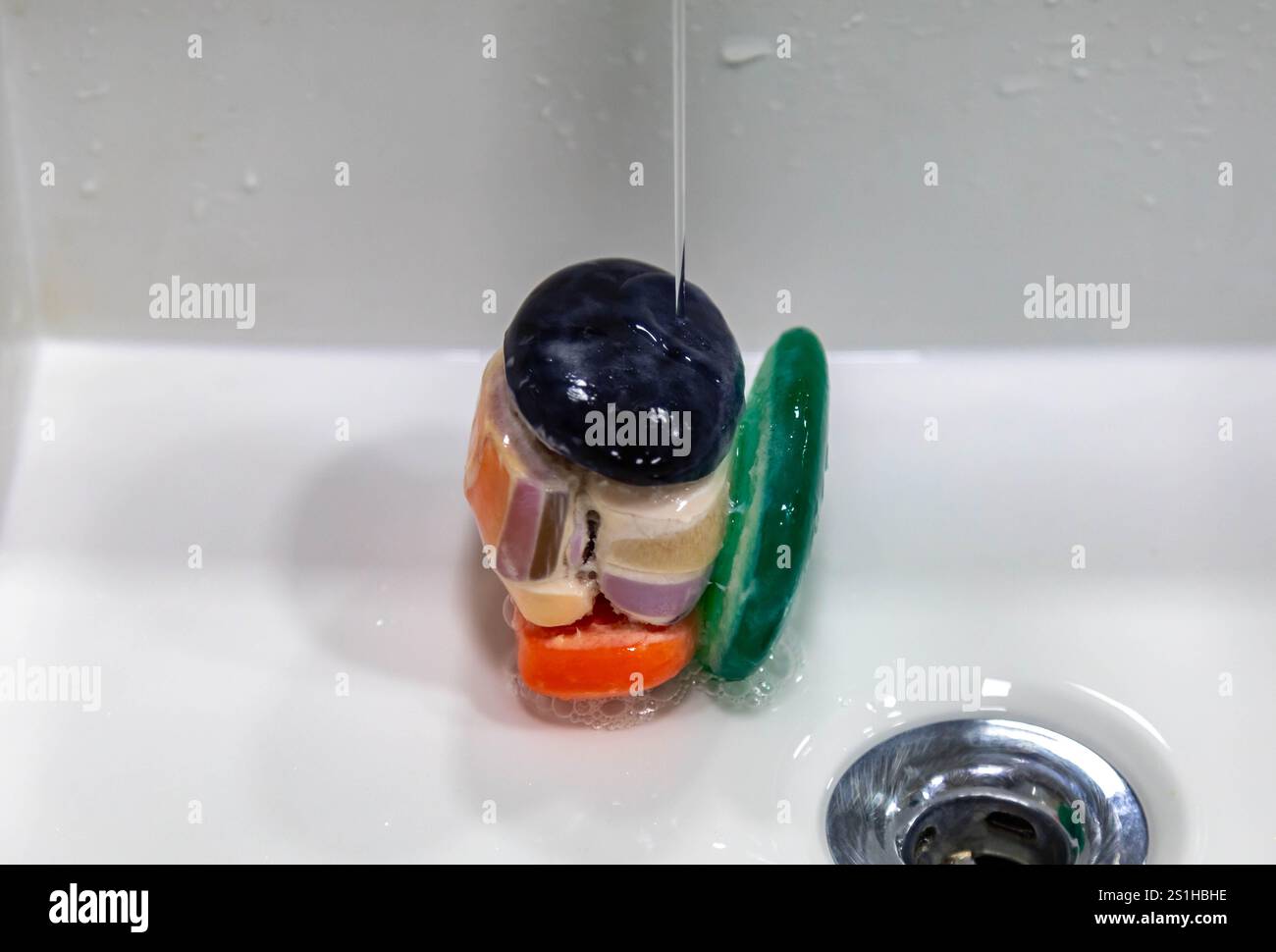 Used soaps glued together to form a ball. Ball of Used Soaps of ...