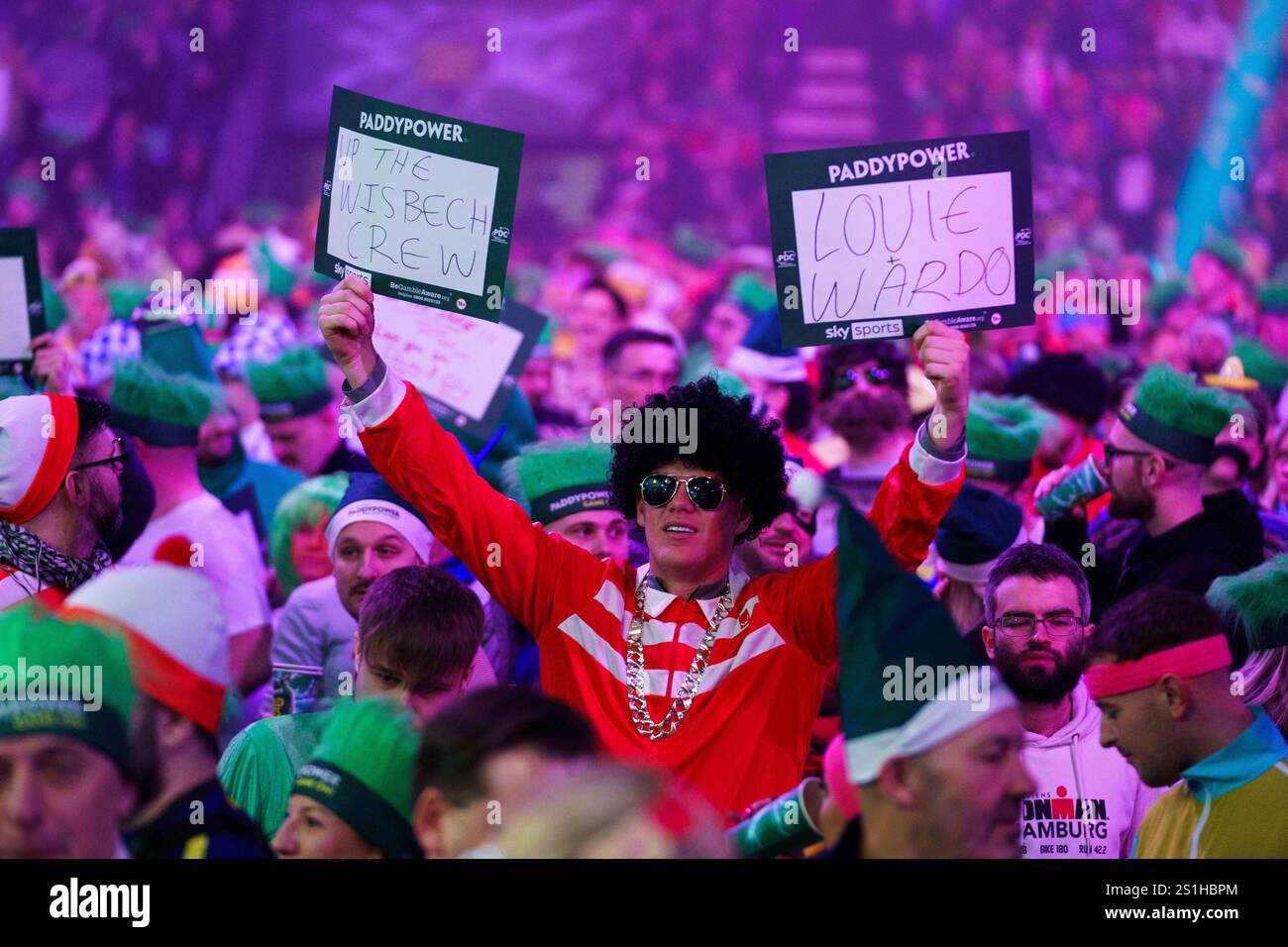 Fans during the final of the Paddy Power World Darts Championship between Luke Littler and ...