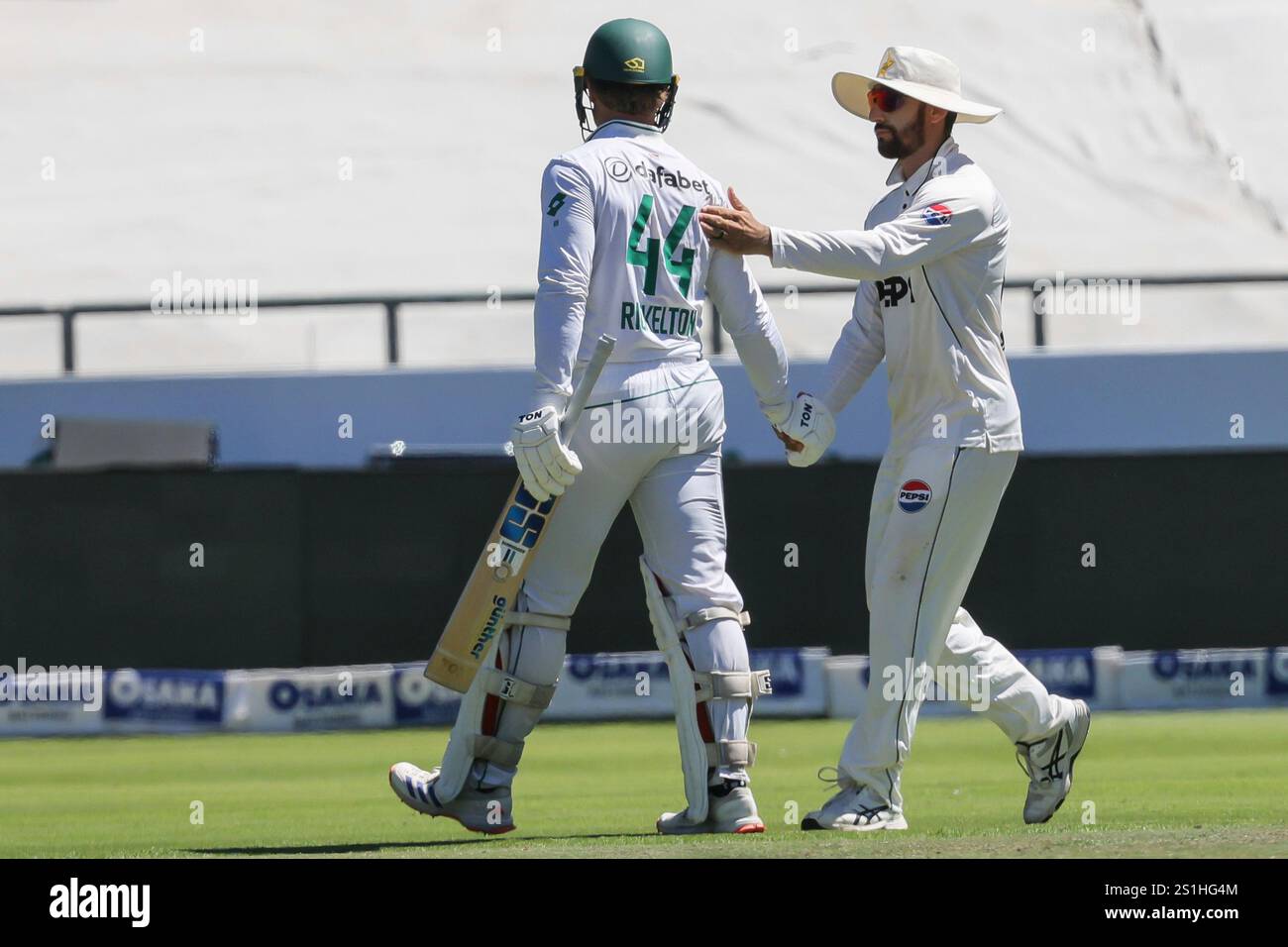 South Africa's Ryan Rickelton, left, is congratulated for his 259 run ...