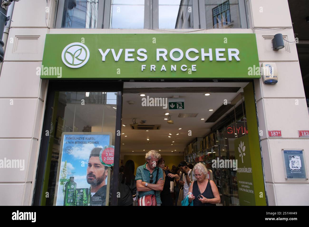 Yves Rocher store facade with people Stock Photo - Alamy