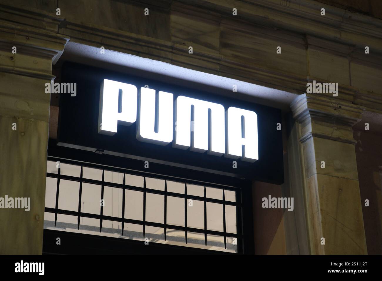 PUMA brand logo store sign Stock Photo - Alamy
