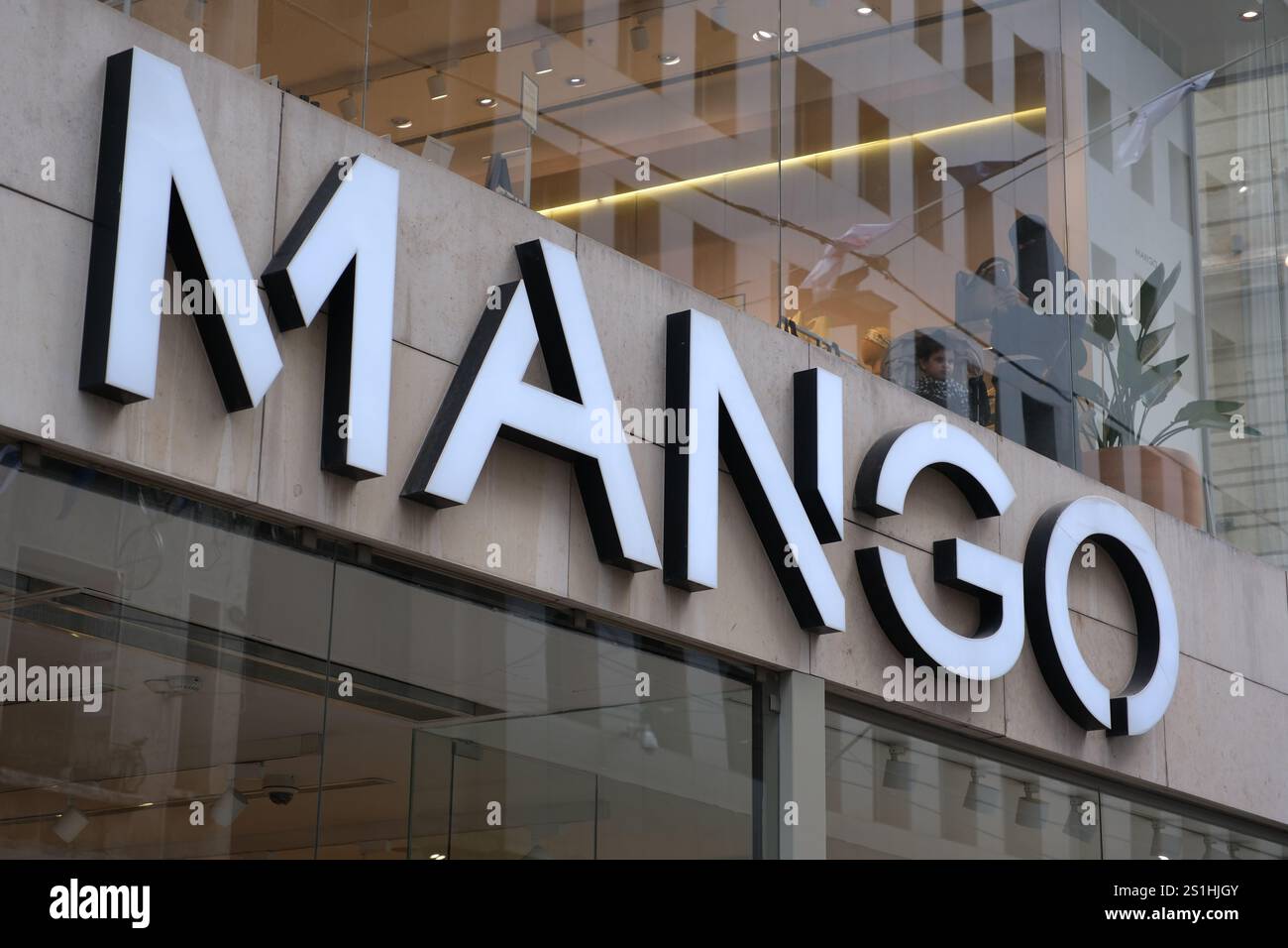 Mango company brand logo Stock Photo - Alamy