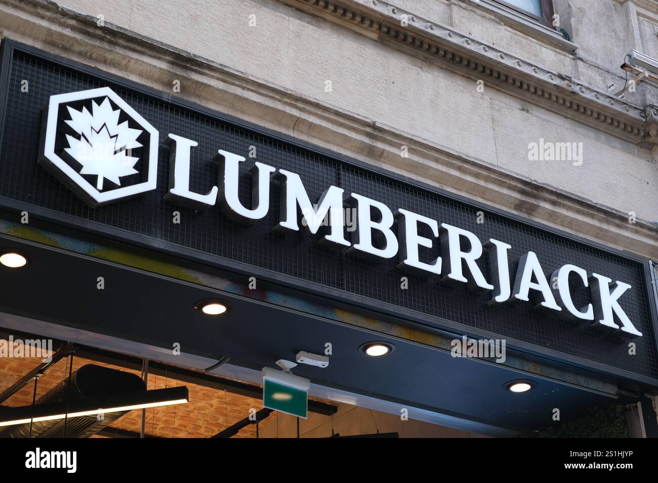 Lumberjack brand logo store sign Stock Photo - Alamy