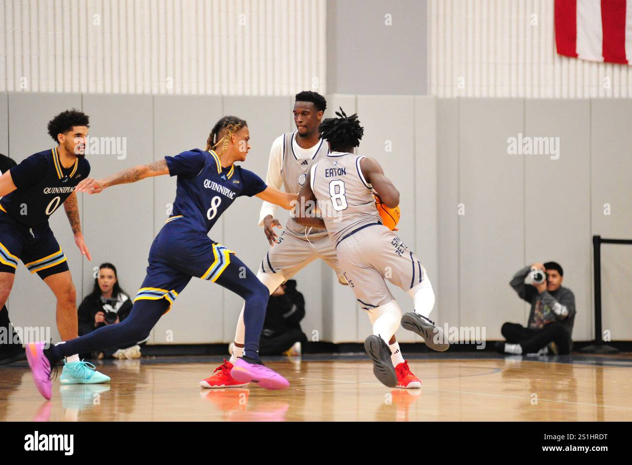 Bryce Eaton (8) drives the lane during Friday's game against Quinnipiac ...